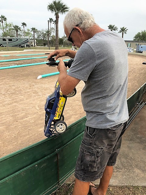 Volunteers build an RC (Remote Control) car track in the RV park ...